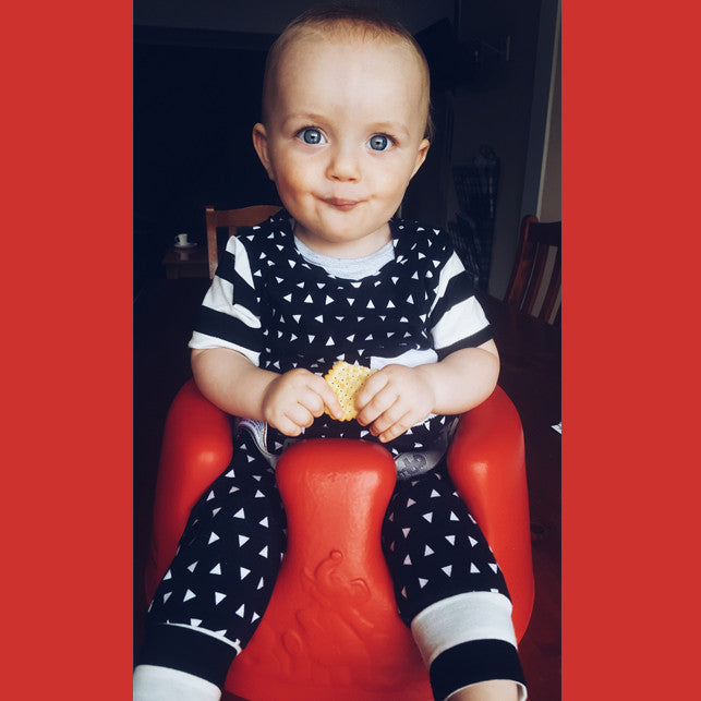 Check out Angus rocking his bright red Bumbo – MooseBaby